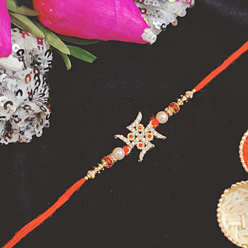 Buy House of Festivals Swastik Pendant Rakhi - With Embellished ...