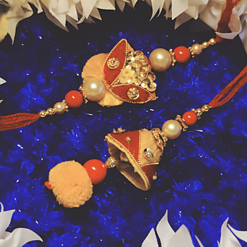 Buy House of Festivals Pair Rakhi - For Bhaiya/Bhabhi, Orange & Red ...