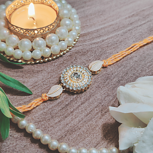 Buy House of Festivals Premium White Flower Rakhi - With Sparkling ...