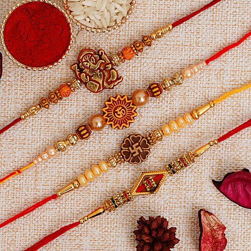 Buy eCraftIndia Designer Religious Rakhis Of Ganesha, Om, Swastik ...